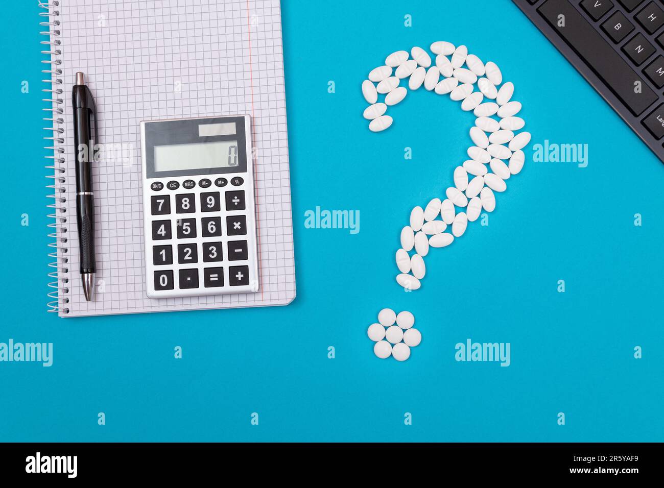 Treatment Costs and Budget. Question Mark Made from White Pills and ...