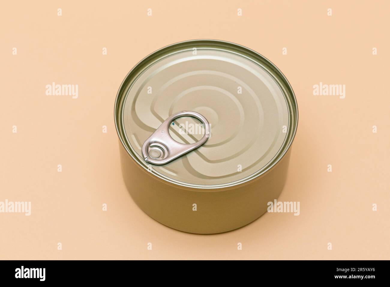 Unopened Tin Can with Blank Edge on Beige Background. Canned Food ...