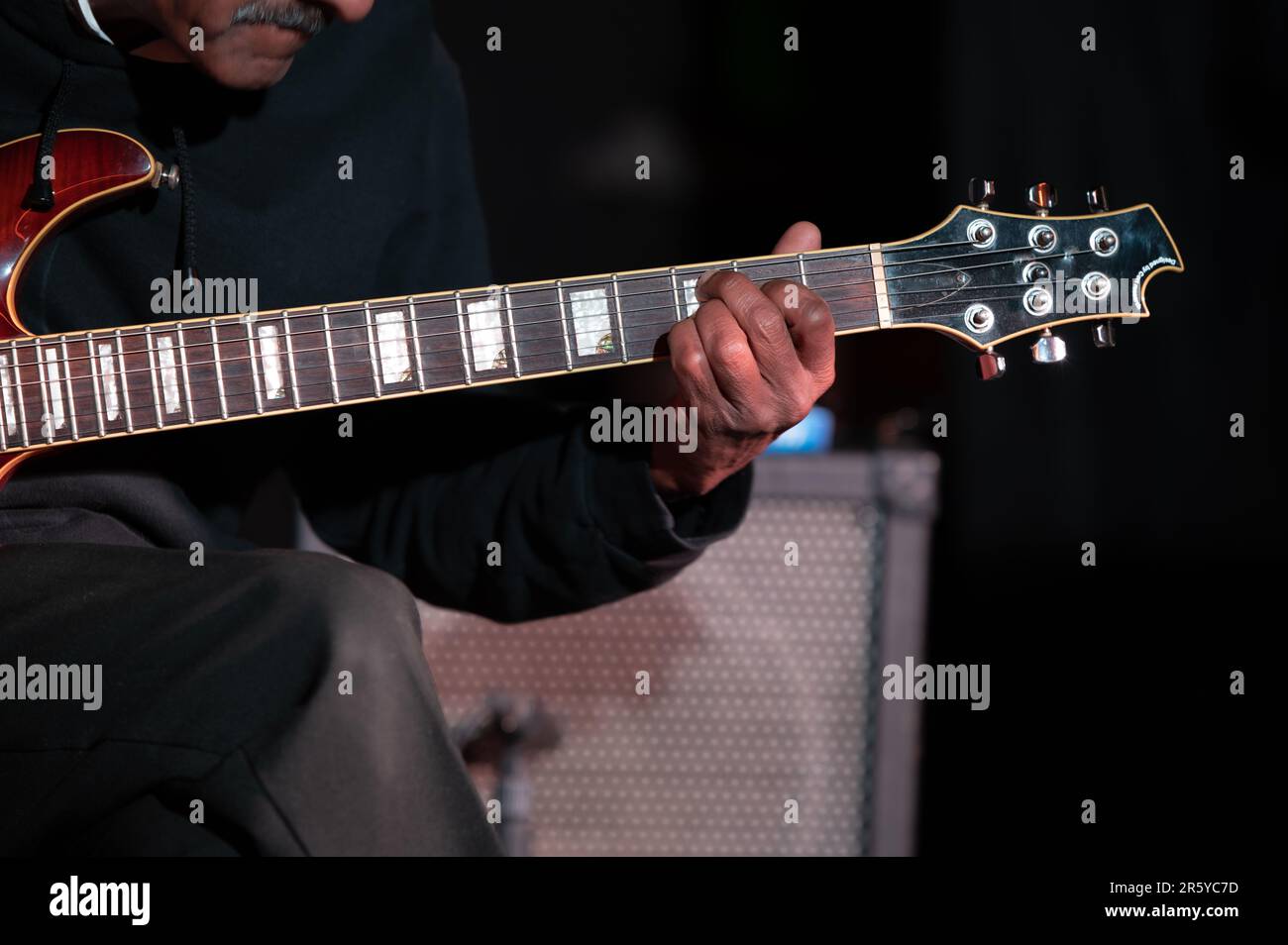 Man fingers playing on guitar hi-res stock photography and images - Alamy