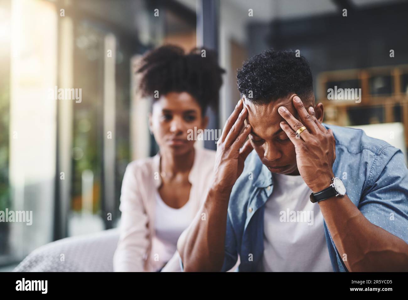 Relationship problems are a pain. a couple having a disagreement at ...