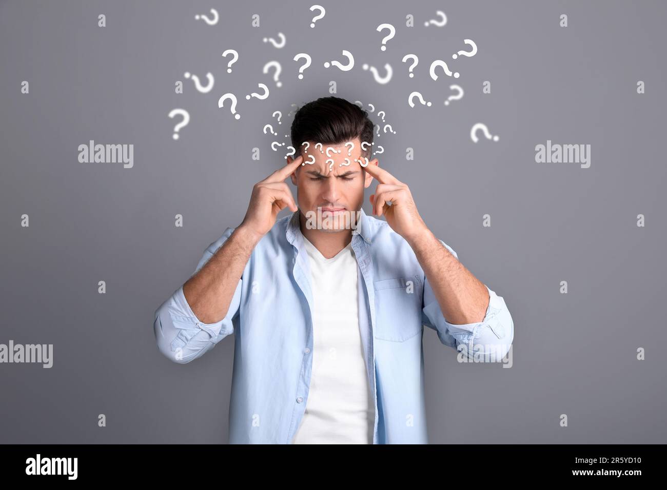 Amnesia Concept Man Surrounded By Question Marks Trying To Remember
