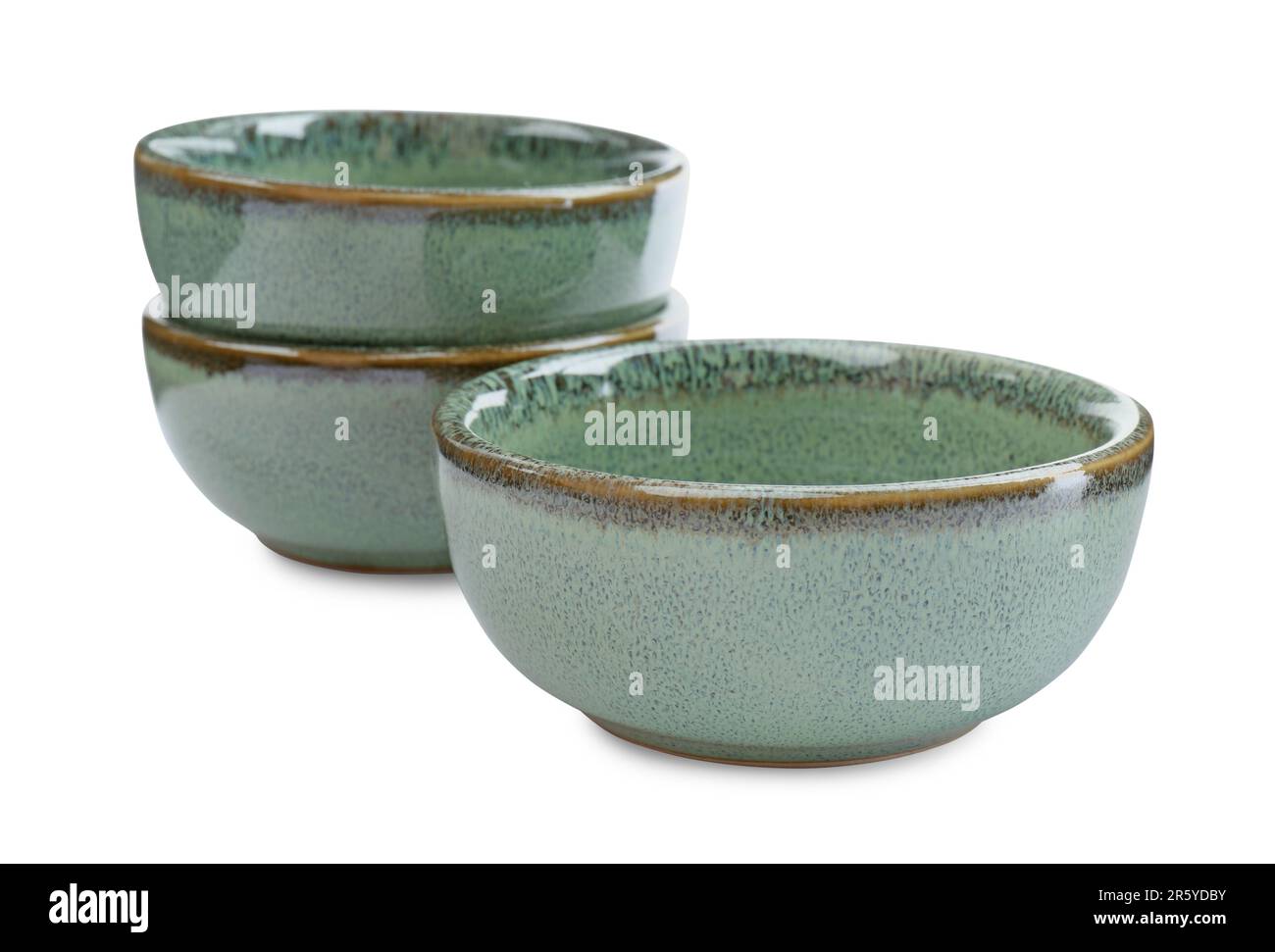 Beautiful green ceramic bowls on white background Stock Photo - Alamy