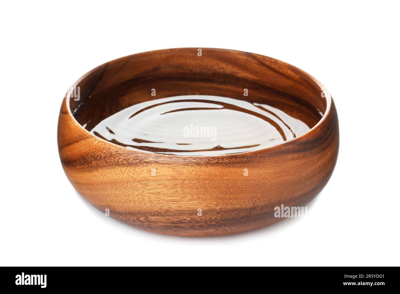 Wooden bowl full of water isolated on white Stock Photo - Alamy