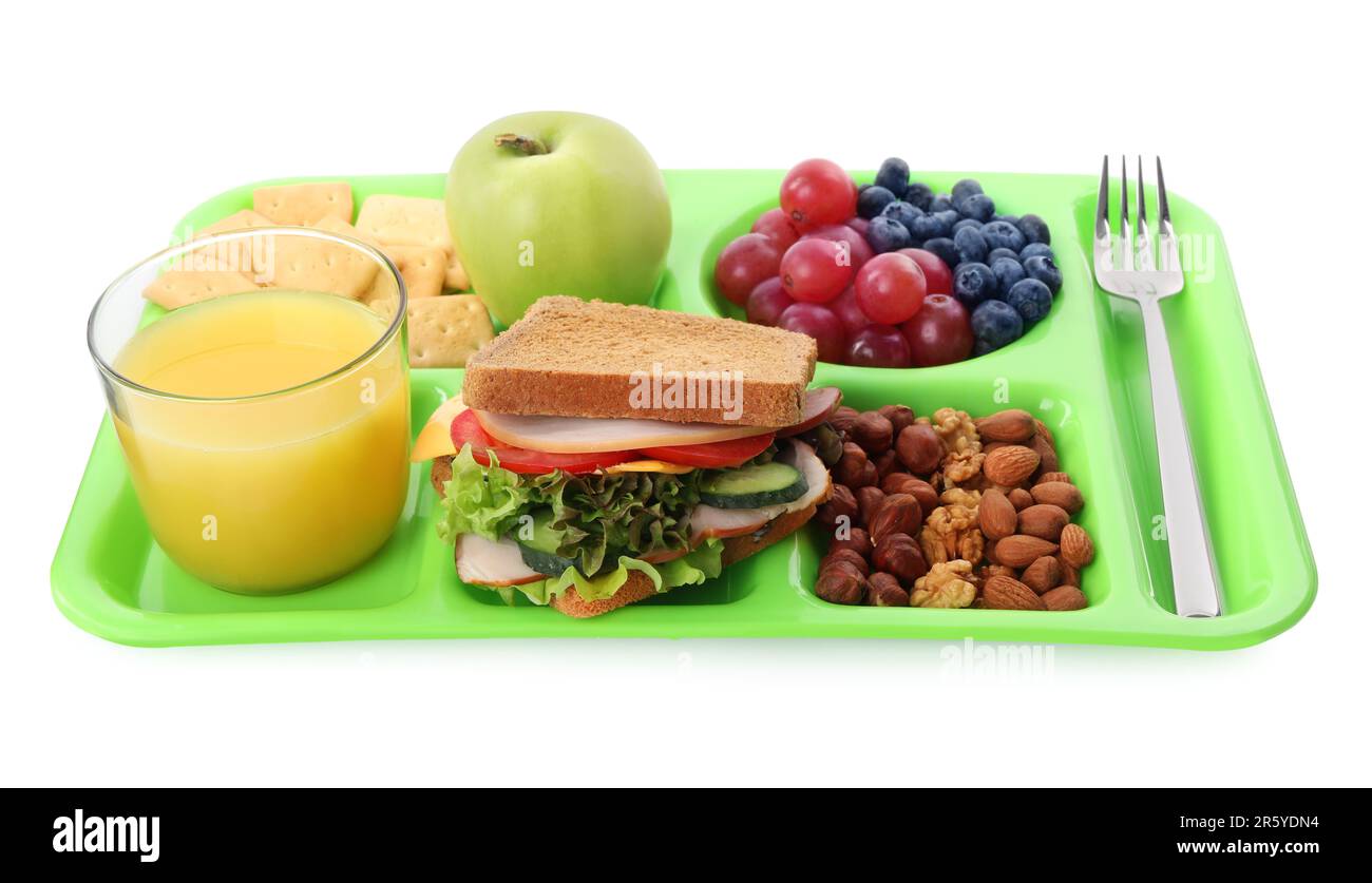 Tray with tasty food and juice on white background. School lunch Stock Photo - Alamy