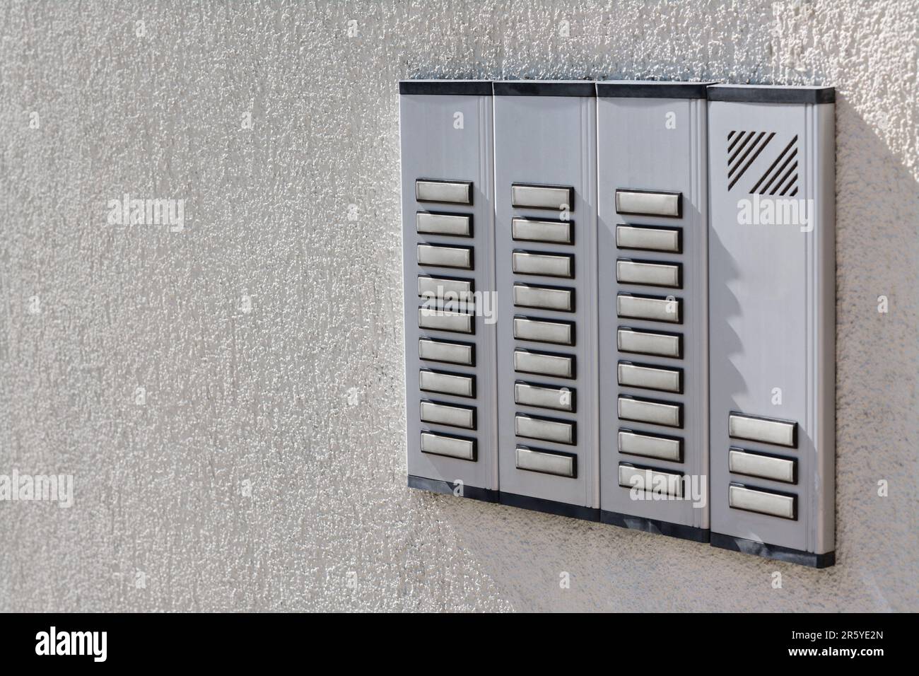 Intercom station on wall outdoors, space for text. Security system ...