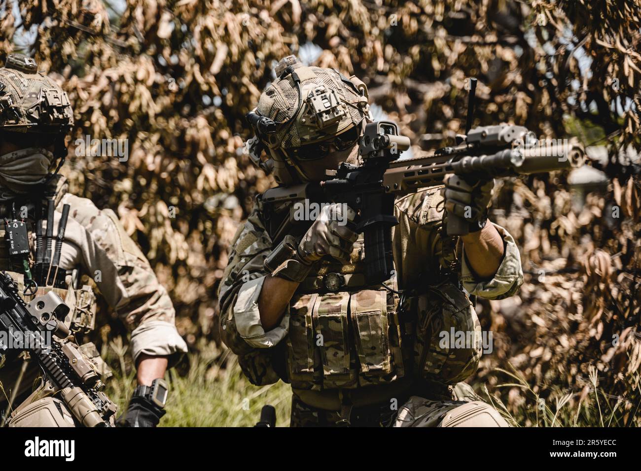 Soldiers running forward and attacking enemy during military operation ...