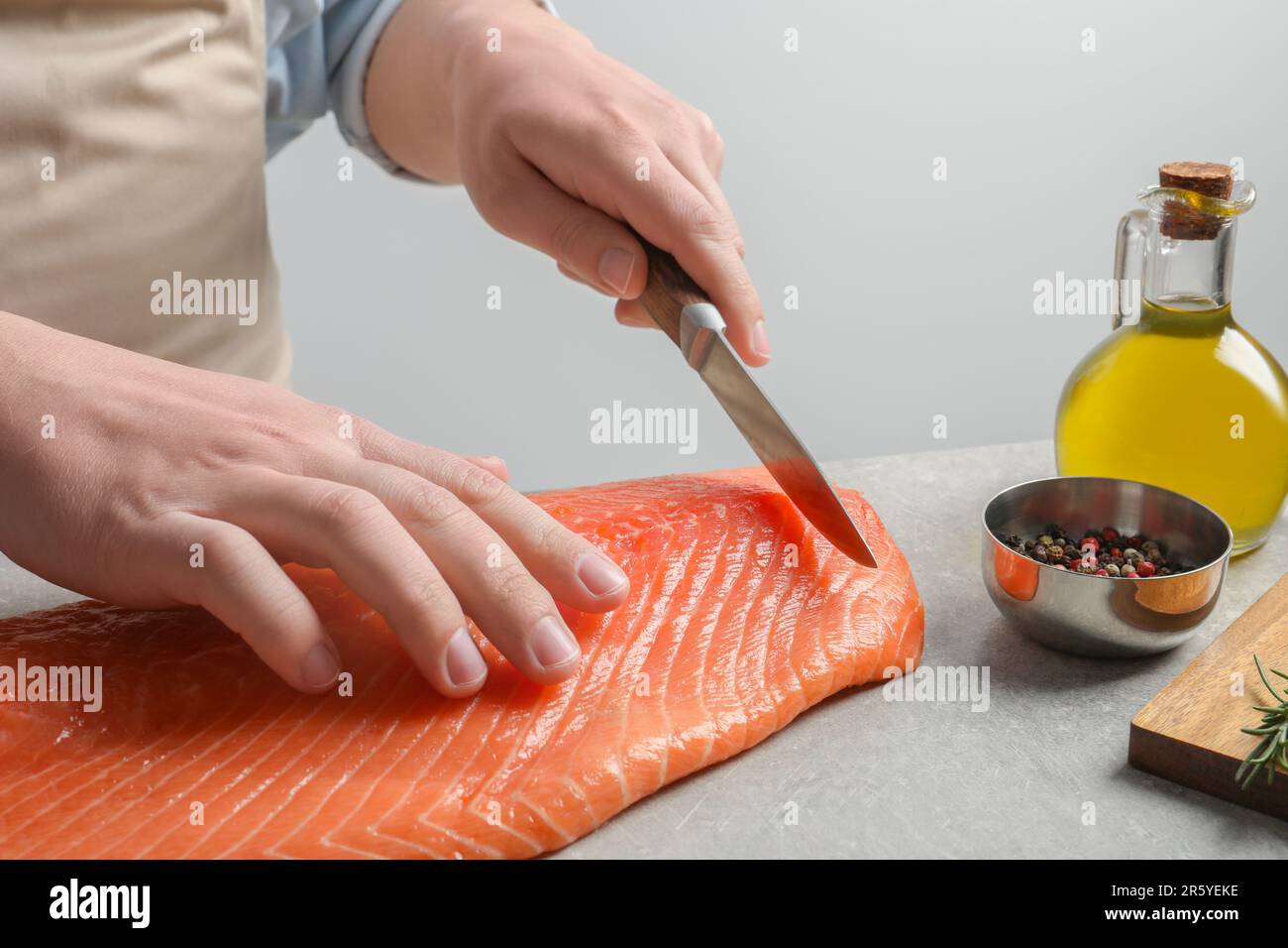 Man hands cutting meat dish hi-res stock photography and images - Alamy