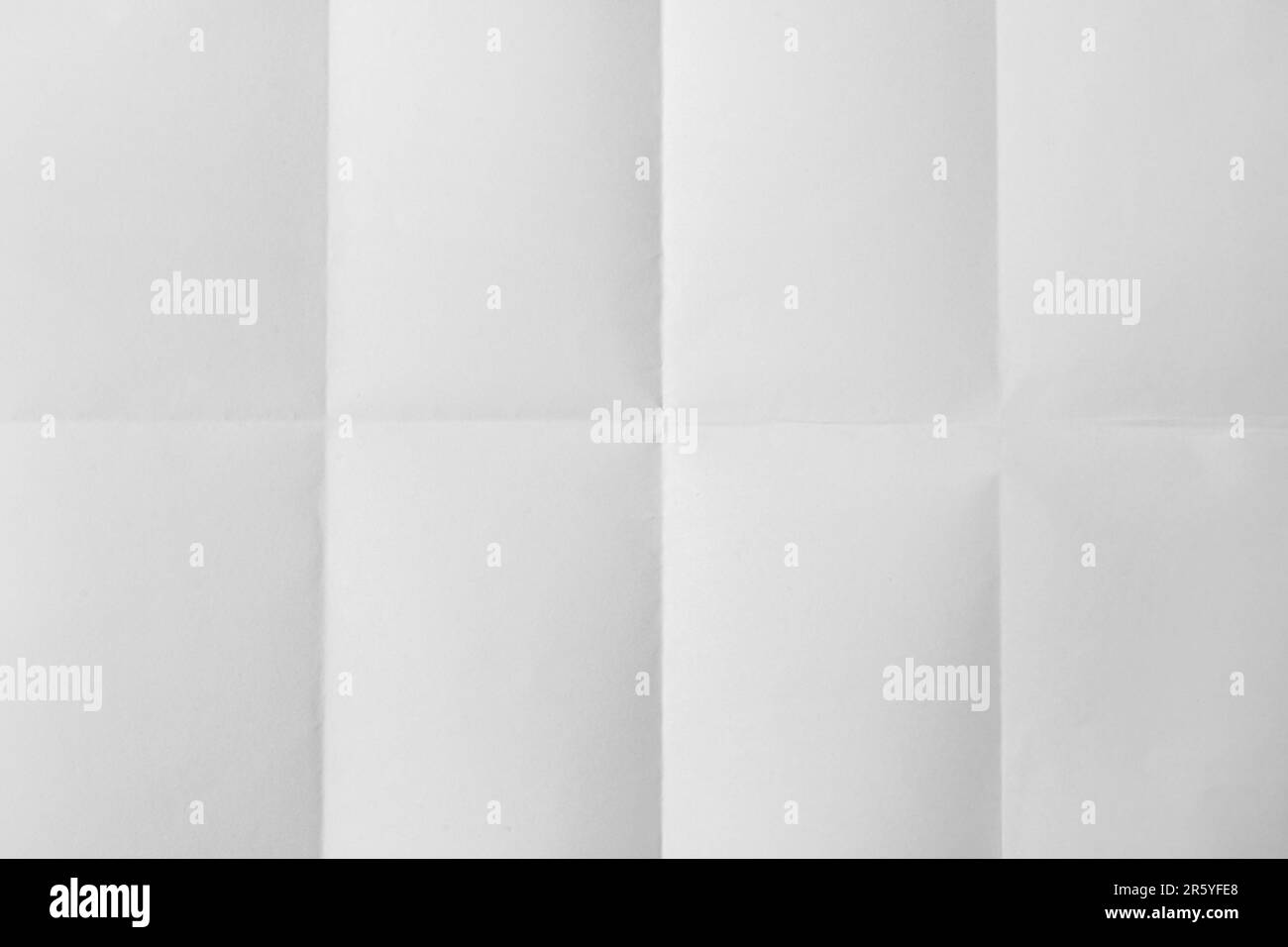 Sheet of folded white paper as background, top view Stock Photo - Alamy