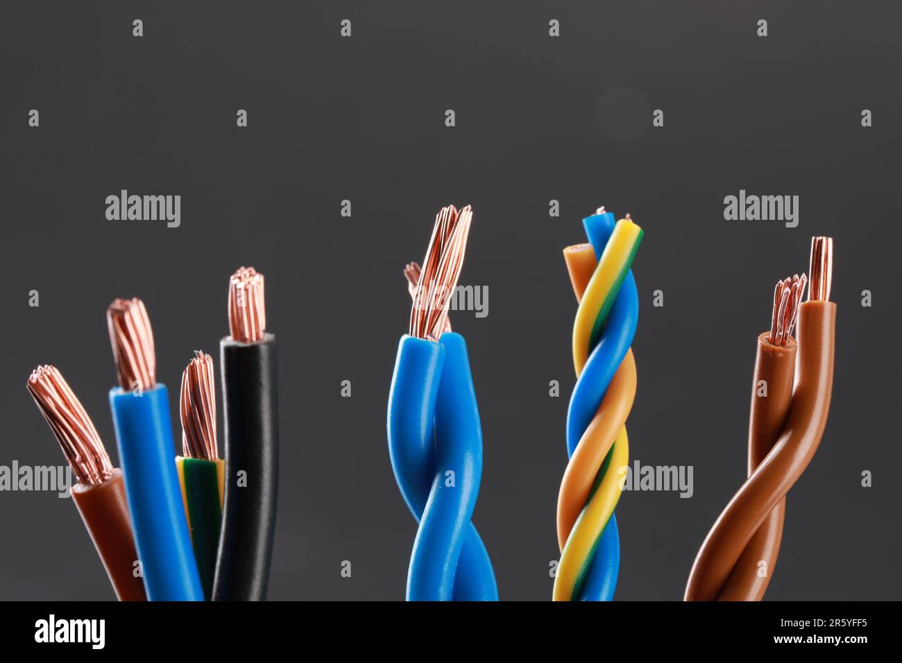 New colorful electrical wires on gray background Stock Photo - Alamy