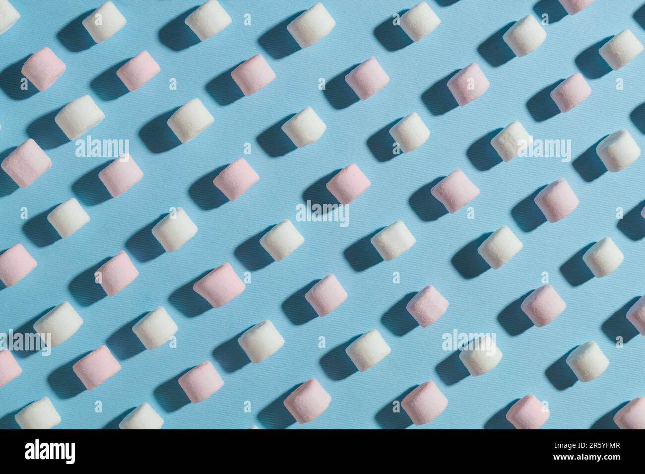 Delicious marshmallows on light blue background, flat lay Stock Photo ...