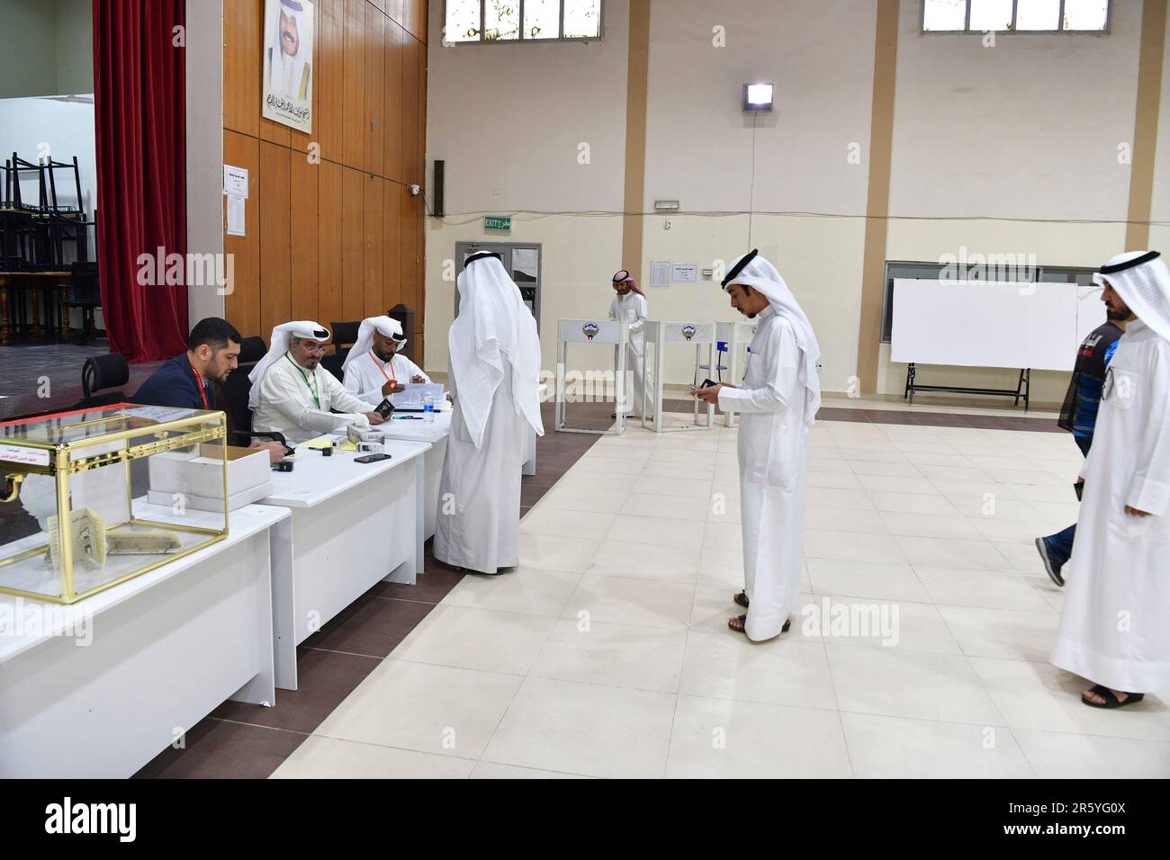 People cast their votes in National Assembly elections at a religious ...