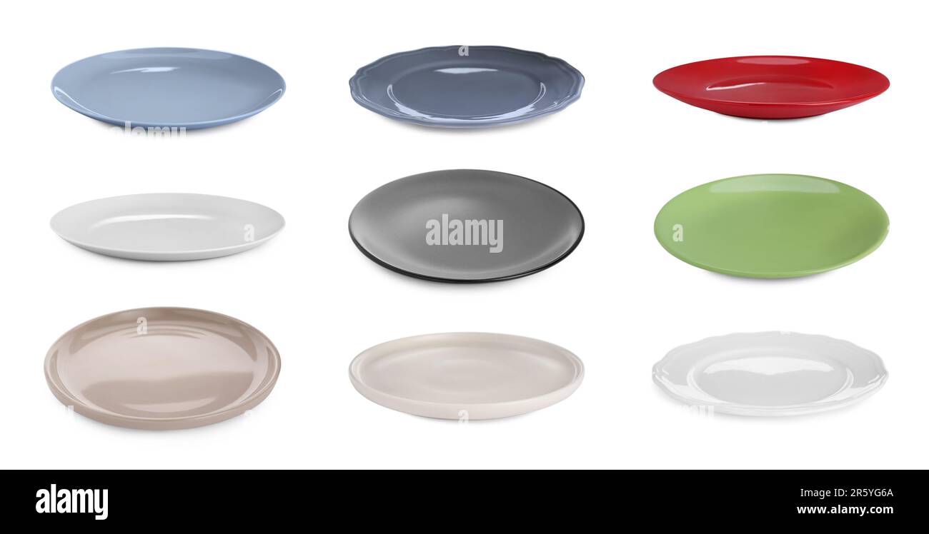 Set of different ceramic plates on white background Stock Photo - Alamy