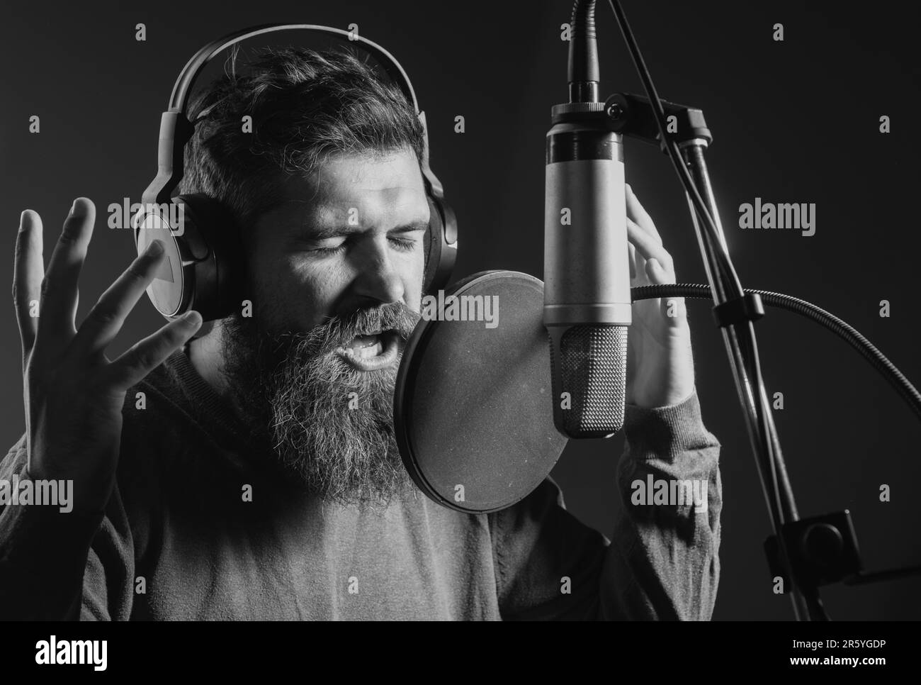 Man singing in recording studio Black and White Stock Photos & Images ...