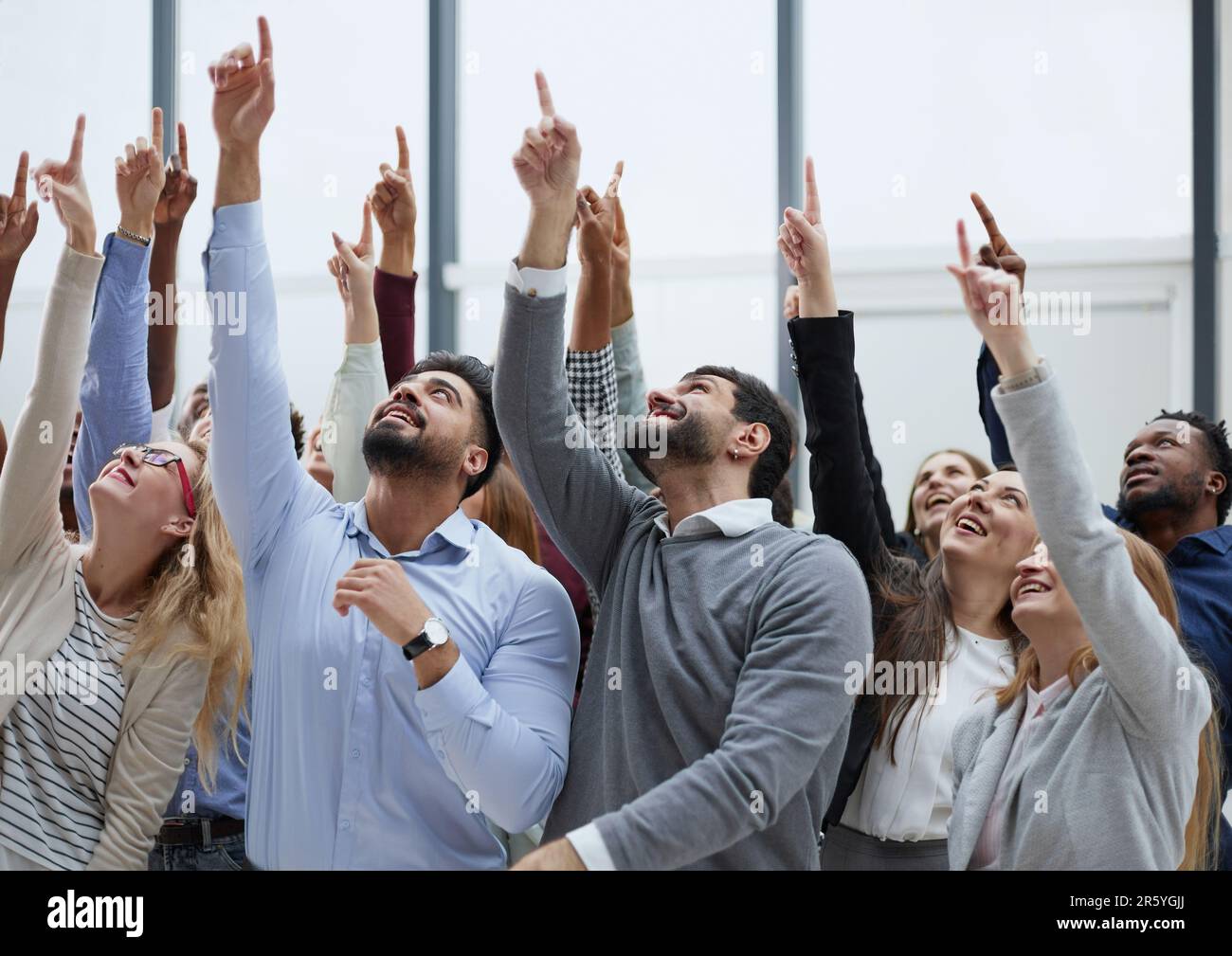 happy group of diverse young people holding their hands up Stock Photo ... happy group of diverse young people holding their hands up Stock Photo ...