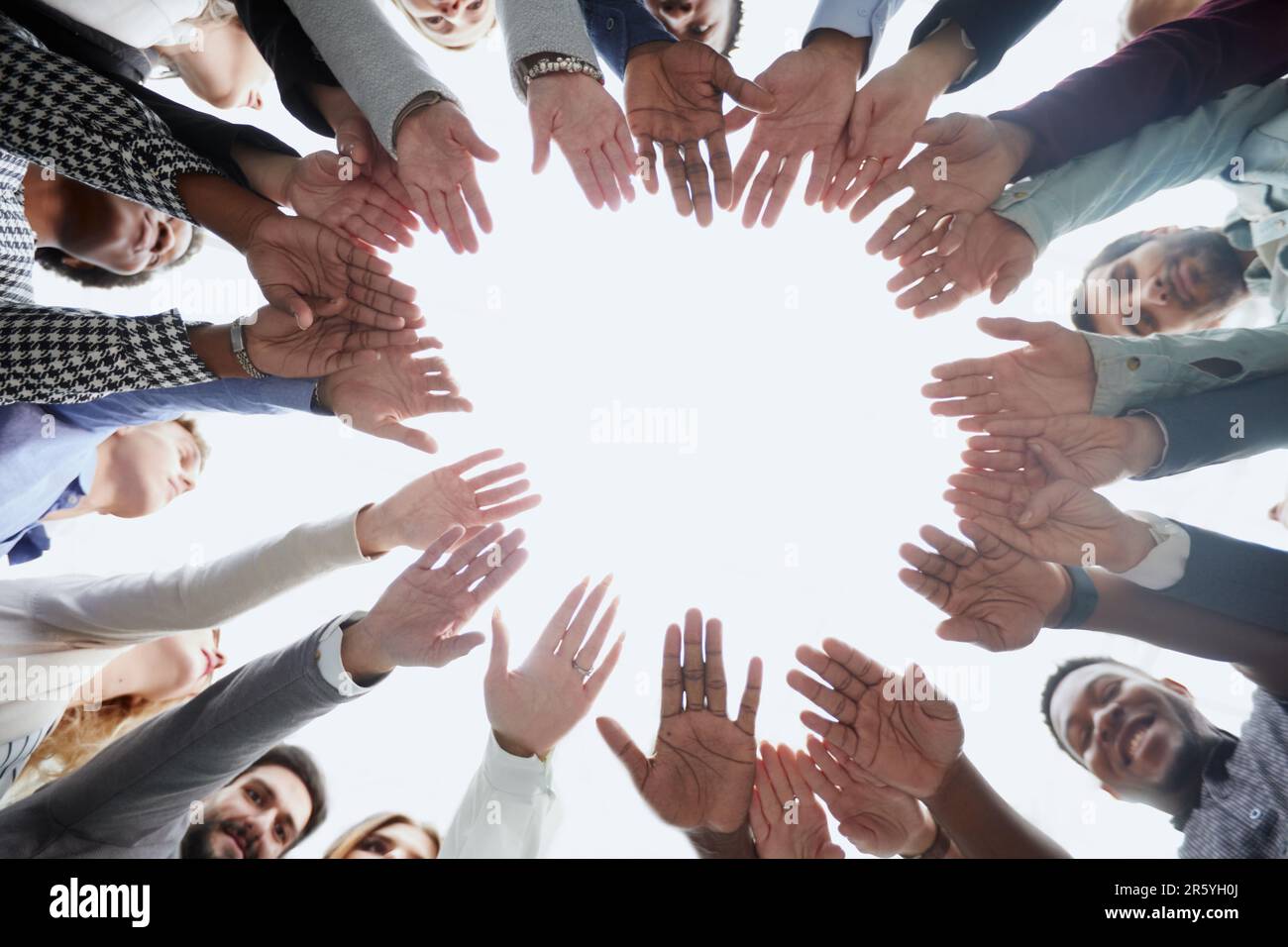 People of different ethnicities uniting to cooperate together Stock ...