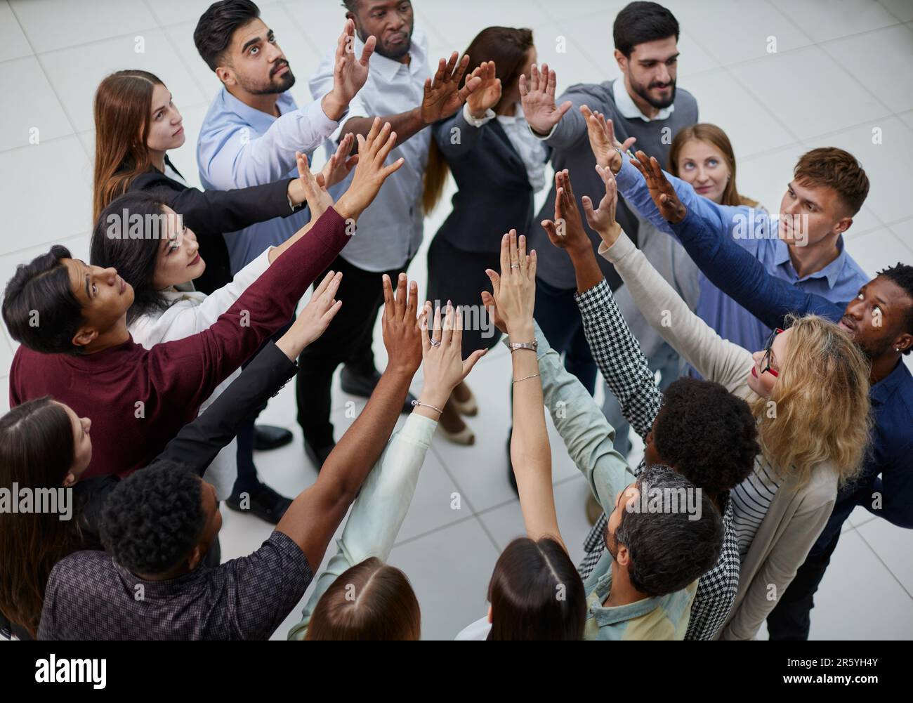 People of different ethnicities uniting to cooperate together Stock ...