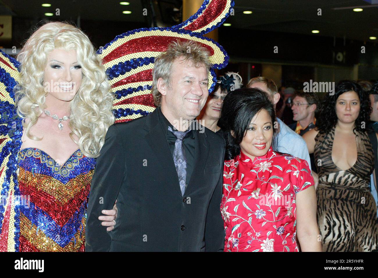 Australian rocker Jimmy Barnes with wife Jane Barnes and drag artist on ...