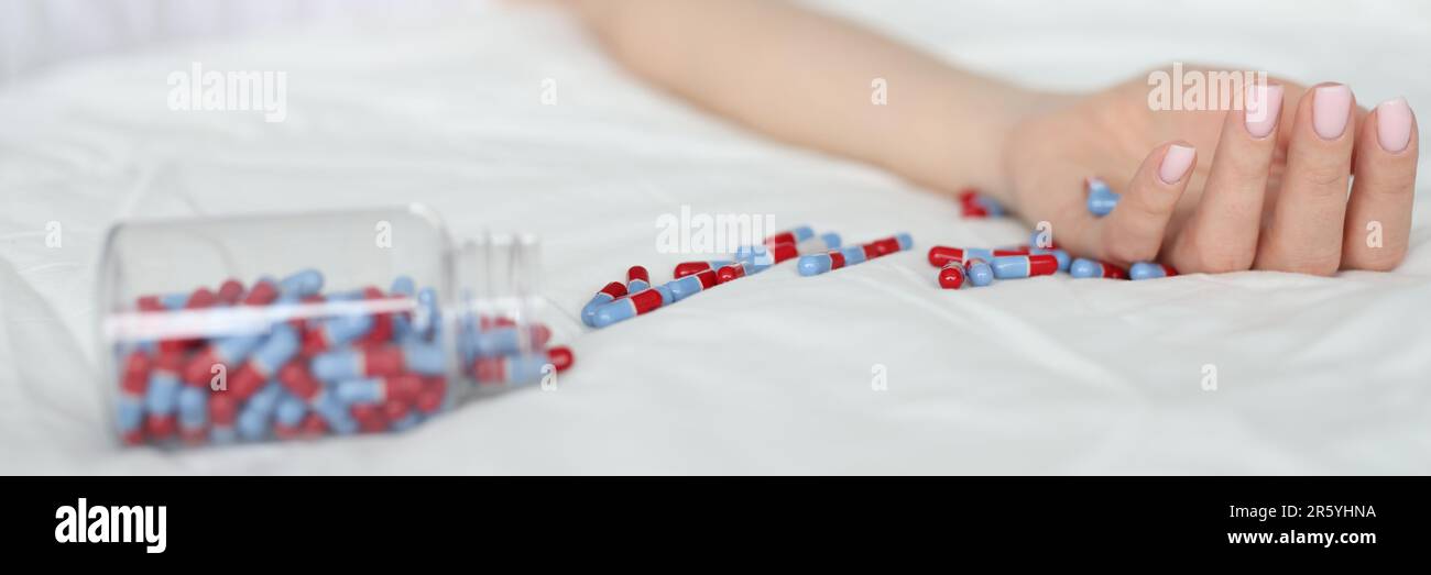 Overdose pills and drug addict background. Woman sleeps unconscious ...