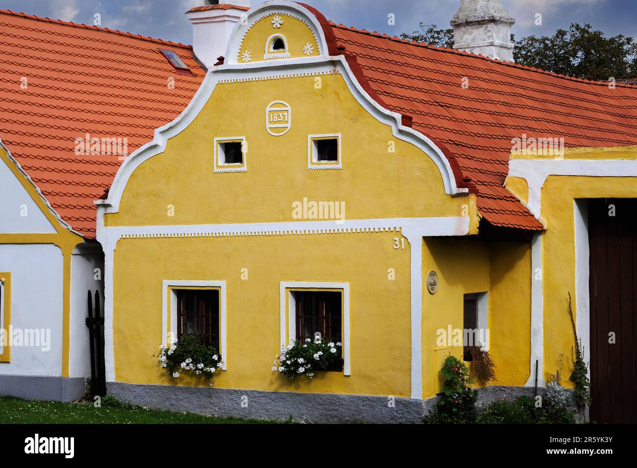 House with the year it was built, 1831, displayed on its gable. In ...