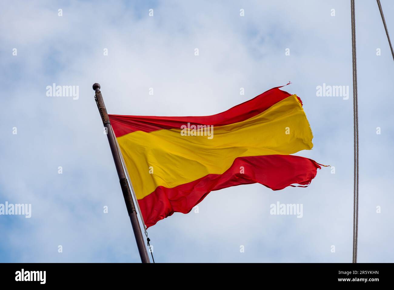 Torn Spanish flag on replica 17th century Spanish galleon at Southend ...