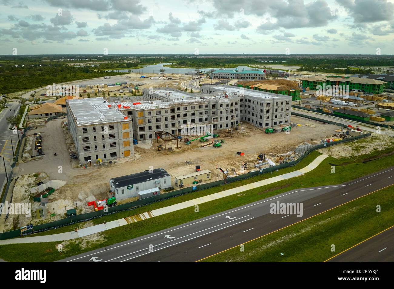 Top view of apartment buildings under construction in new developing ...