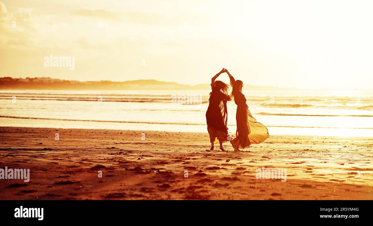 Free your gypsy soul. young people together on the beach Stock Photo ...