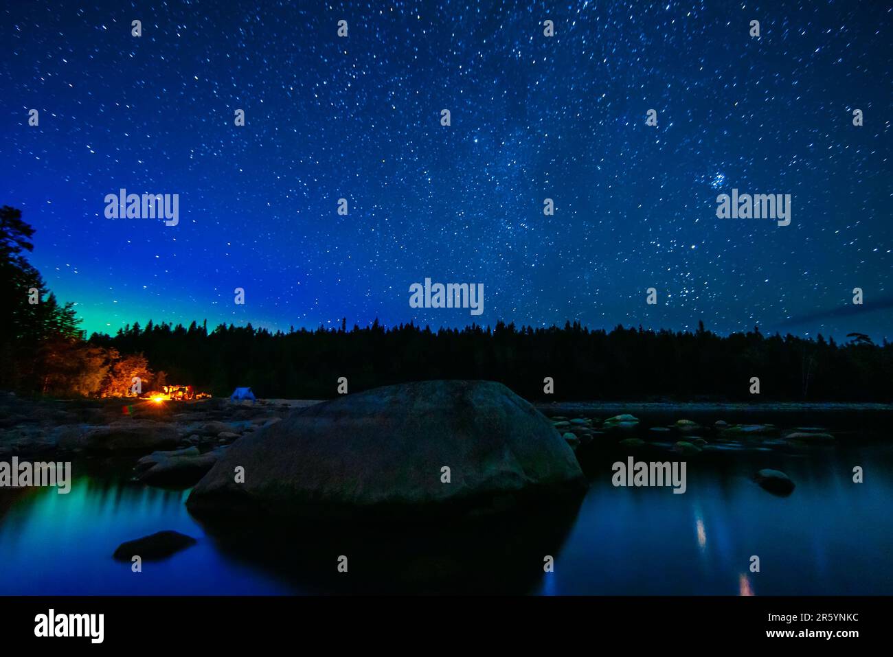 night landscape with a starry sky and the milky way with stars and ...