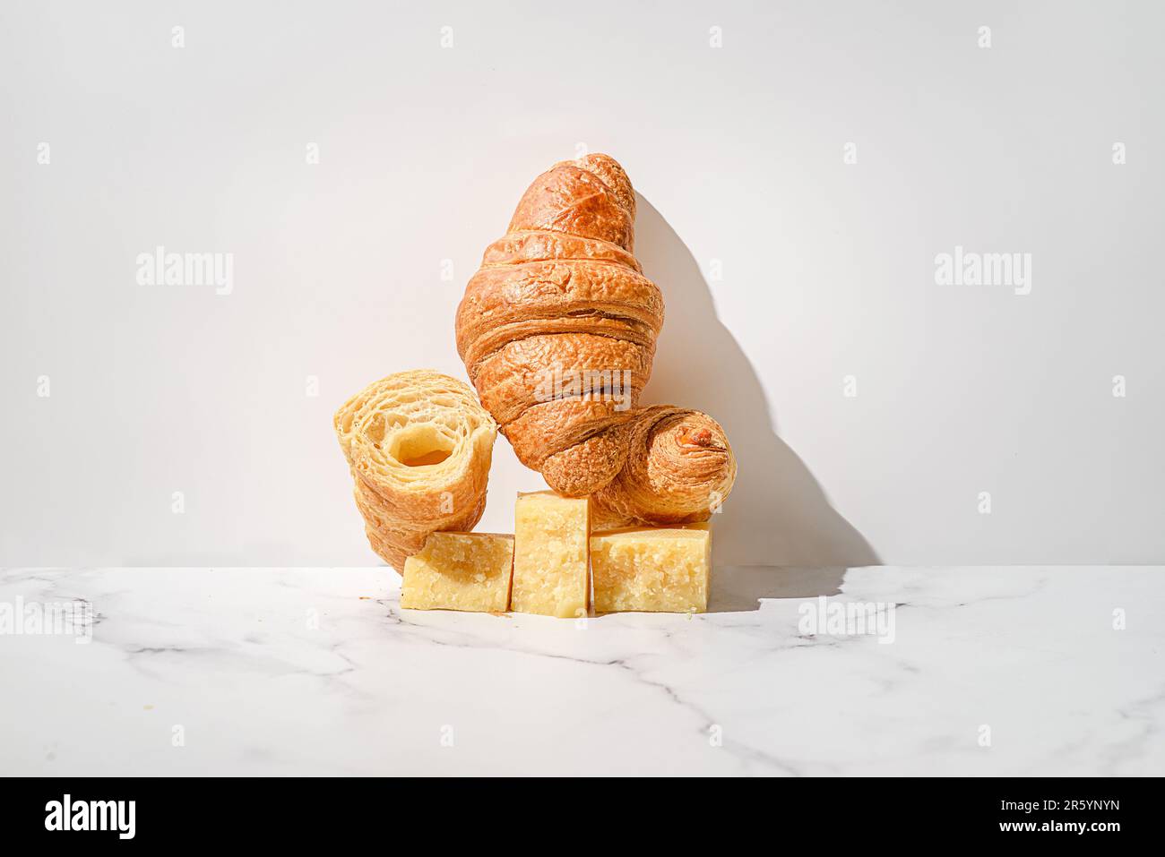 croissant with cheese on a white background Stock Photo - Alamy