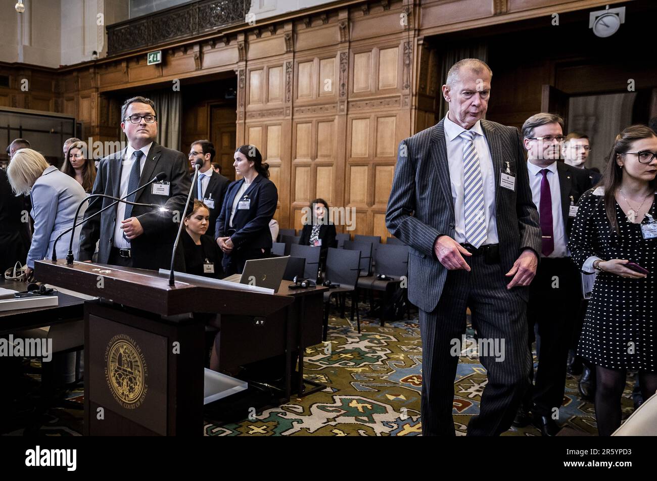 THE HAGUE - Anton Korynevych (L, lawyer from Ukraine) watches the ...