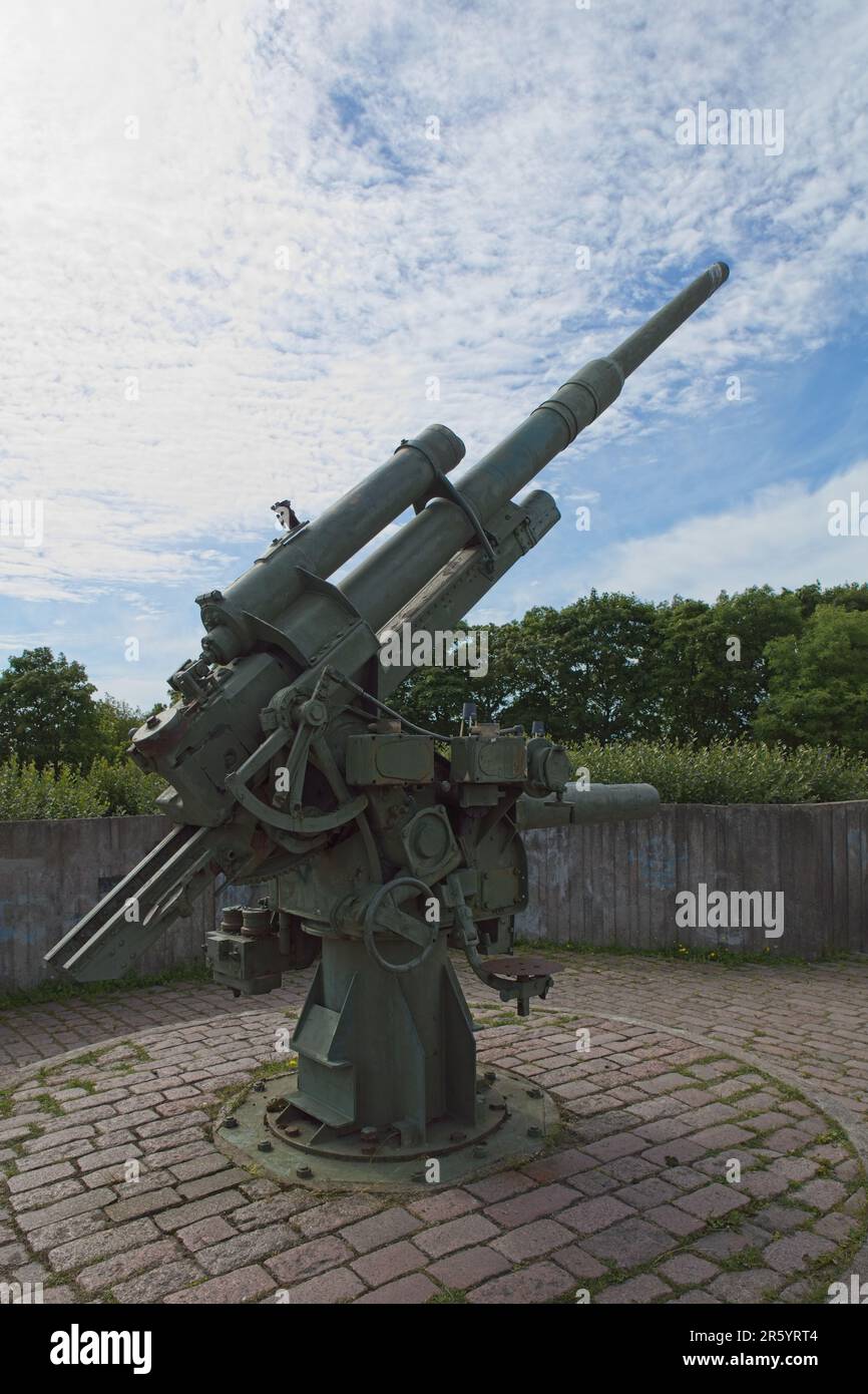 Old ww2 anti-aircraft gun memorial in cloudy summer weather, Kotka ...