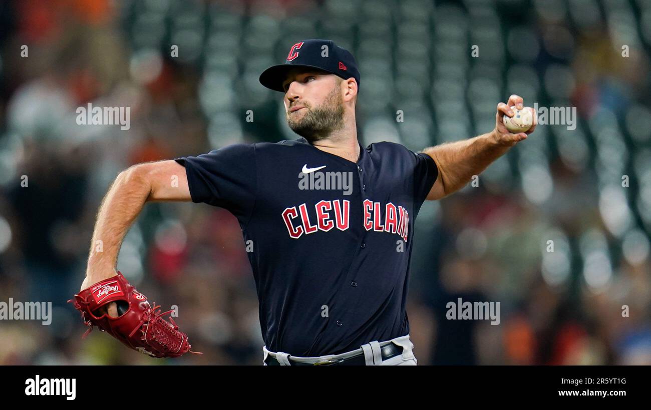 Cleveland Guardians relief pitcher Sam Hentges throw a pitch during the ...