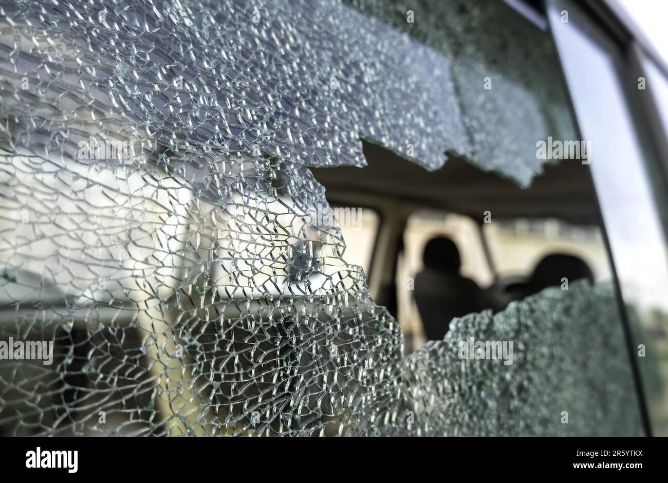 Broken car glass in accident, road safety, driving Stock Photo - Alamy
