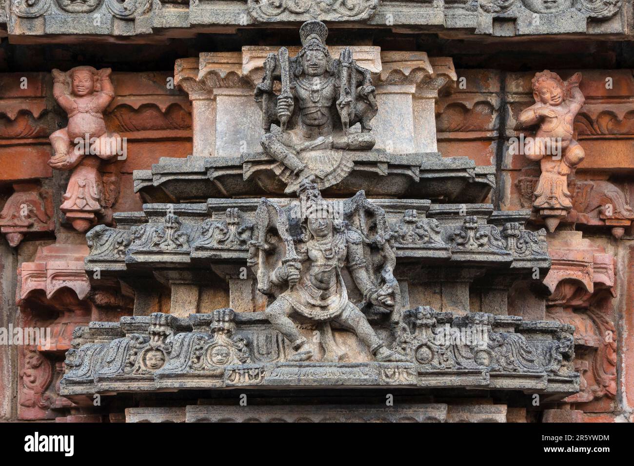 Carved sculptures of Hindu Gods with weapons on the Bugga ...