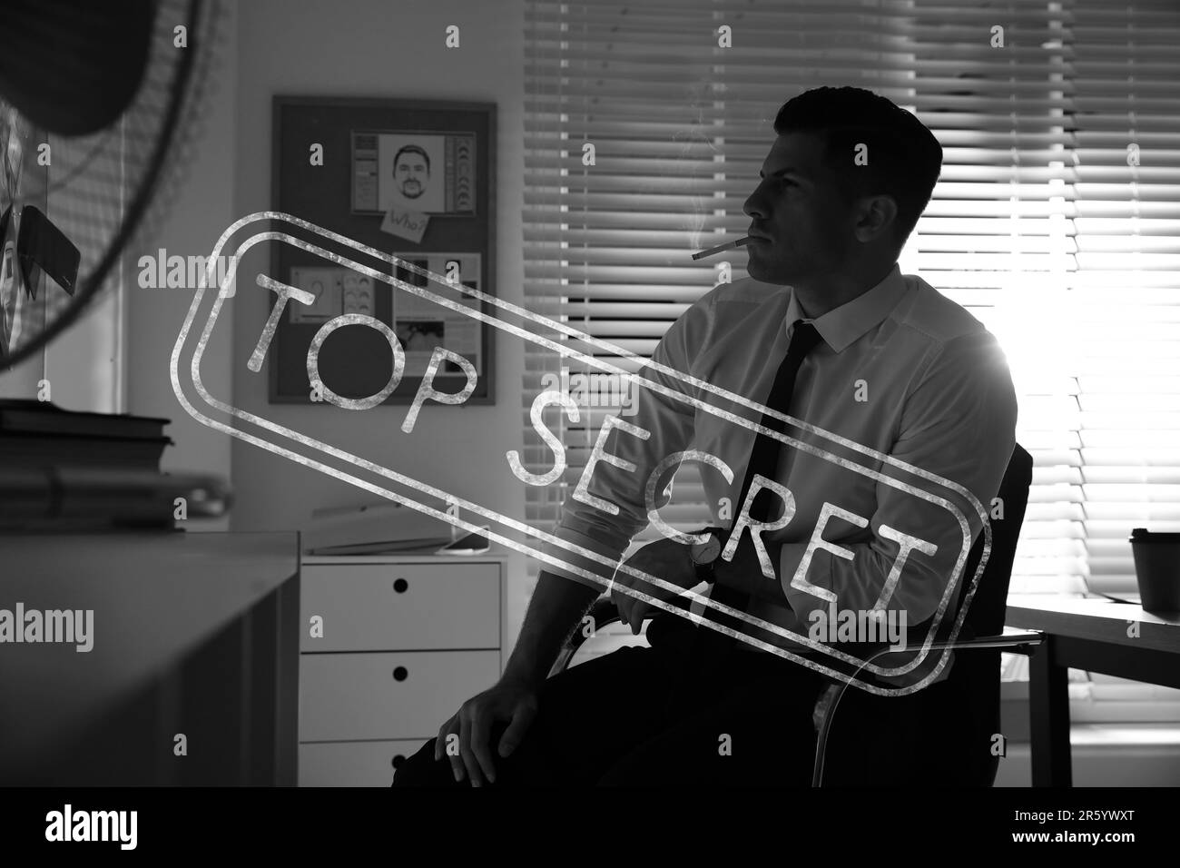 Classified information of investigation. Detective working in office ...