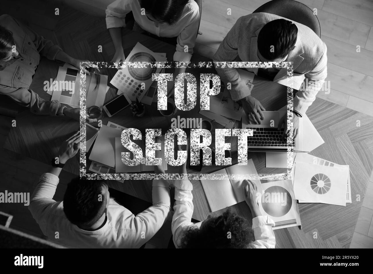 Classified information. Stamp Top Secret on black and white photo of ...