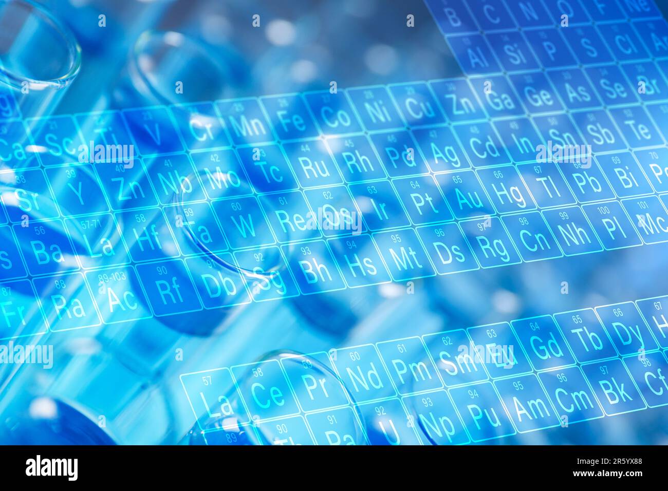 Studying chemistry. Periodic table and test tubes, double exposure ...