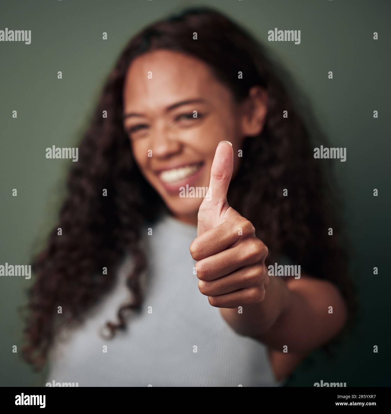 Woman, thumbs up and hand gesture with emoji and agreement, approval ...