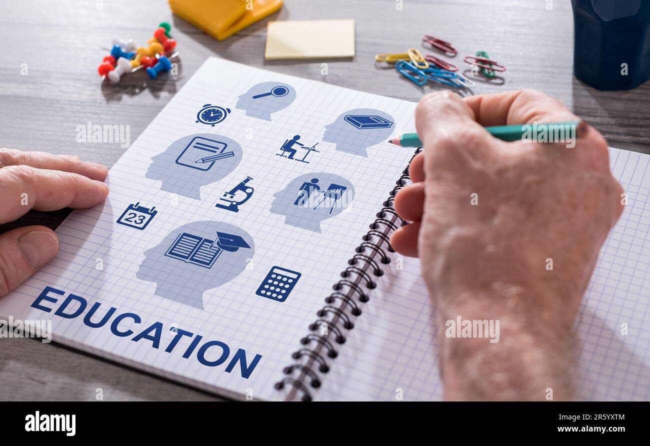 Hand drawing education concept on a notepad Stock Photo - Alamy