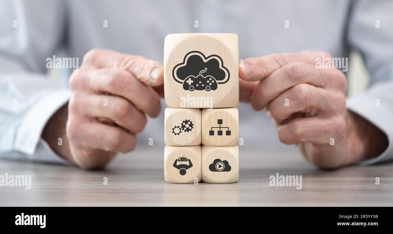 Wooden blocks with symbol of cloud gaming concept Stock Photo - Alamy