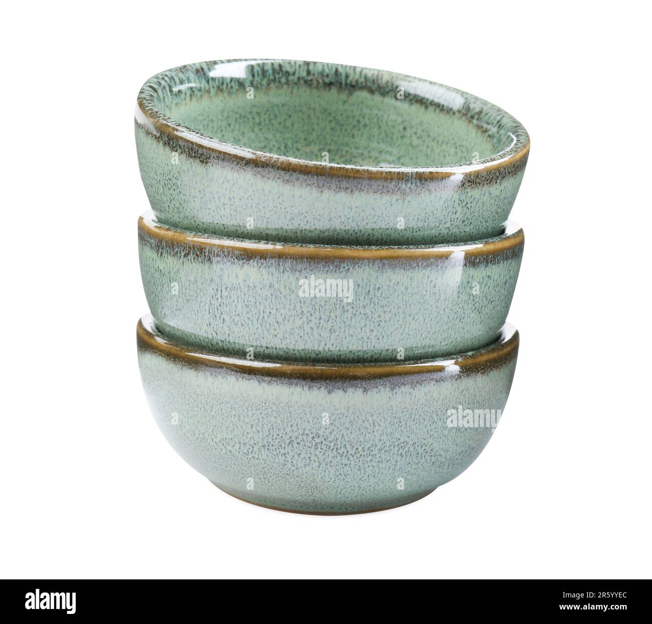 Beautiful green ceramic bowls on white background Stock Photo - Alamy