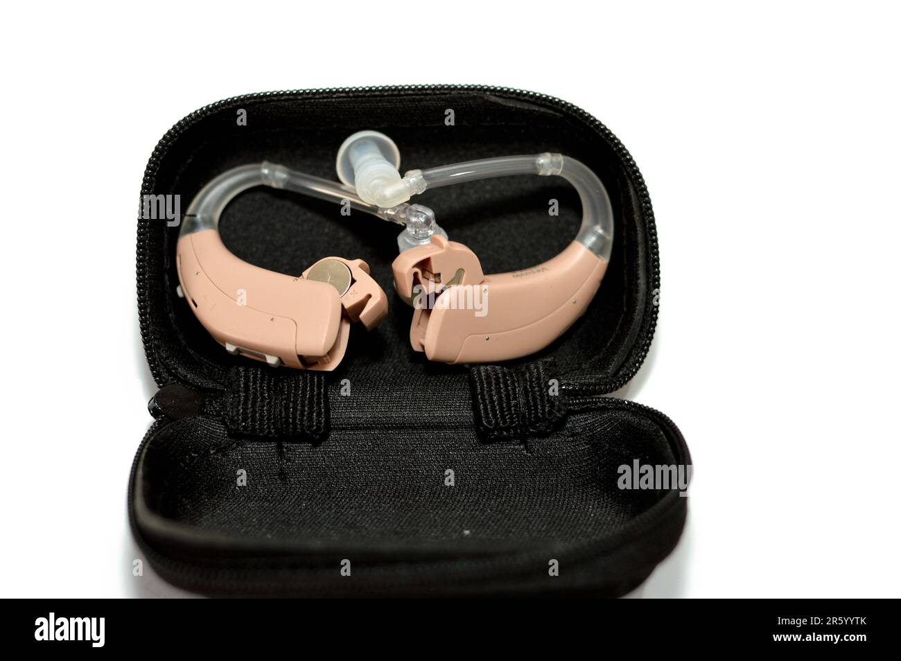 Cairo, Egypt, June 4 2023: Vesuvio Hearing Aid -XTM P beige color for seniors adults to improve ...