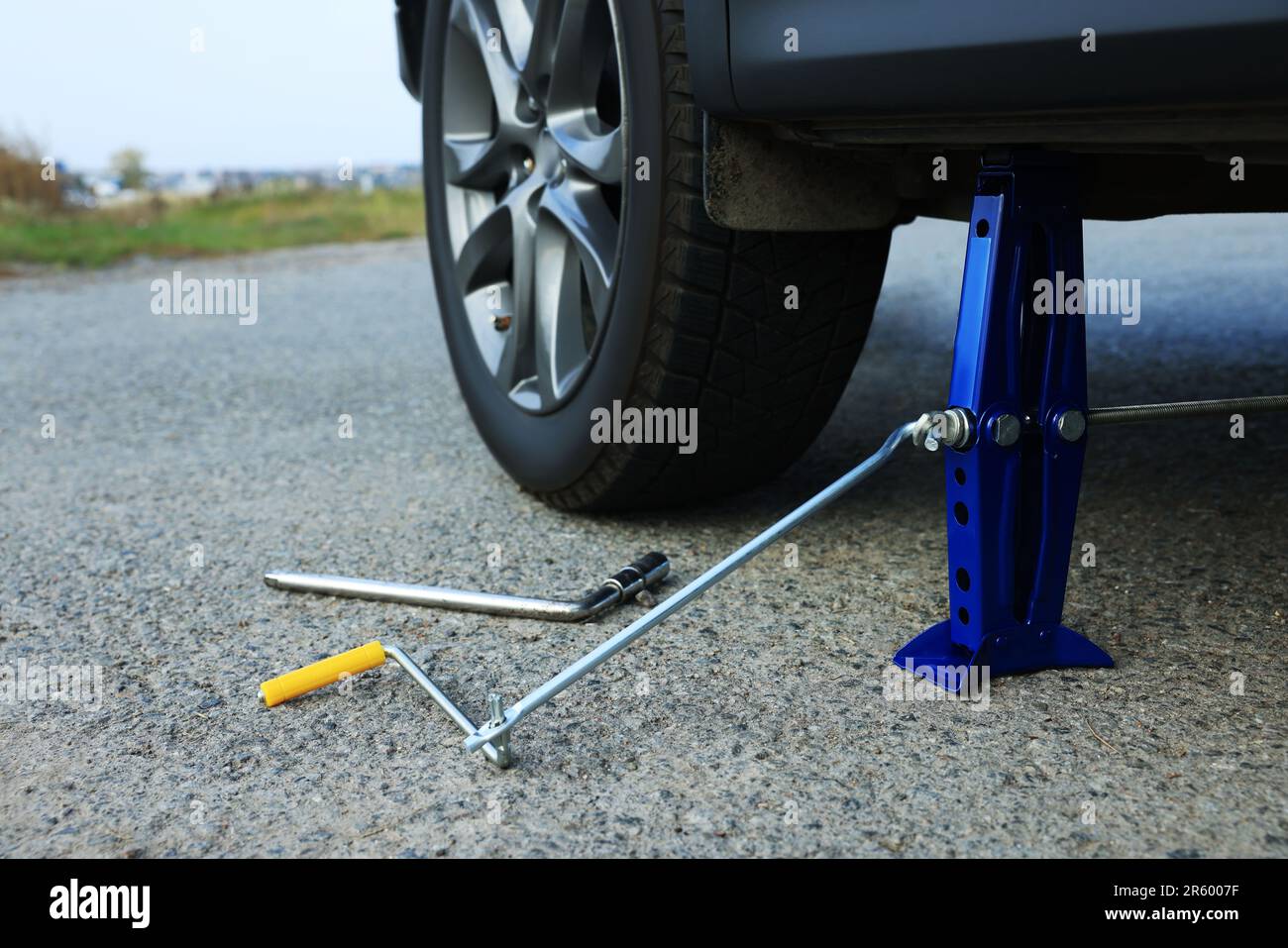 Car without wheel lifted hi-res stock photography and images - Alamy