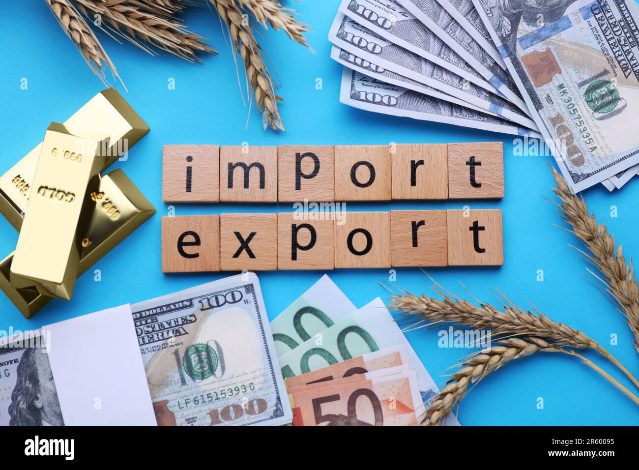 Words Import and Export made of wooden squares, ears of wheat ...