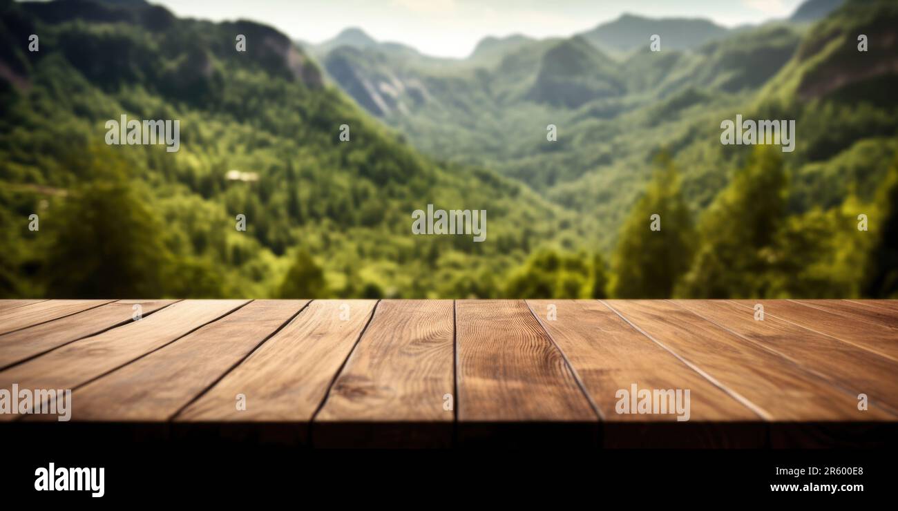 The empty wooden brown table top with blur background of trekking path ...