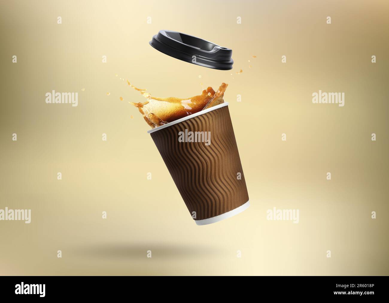 Takeaway paper cup with splashing coffee falling on beige background ...