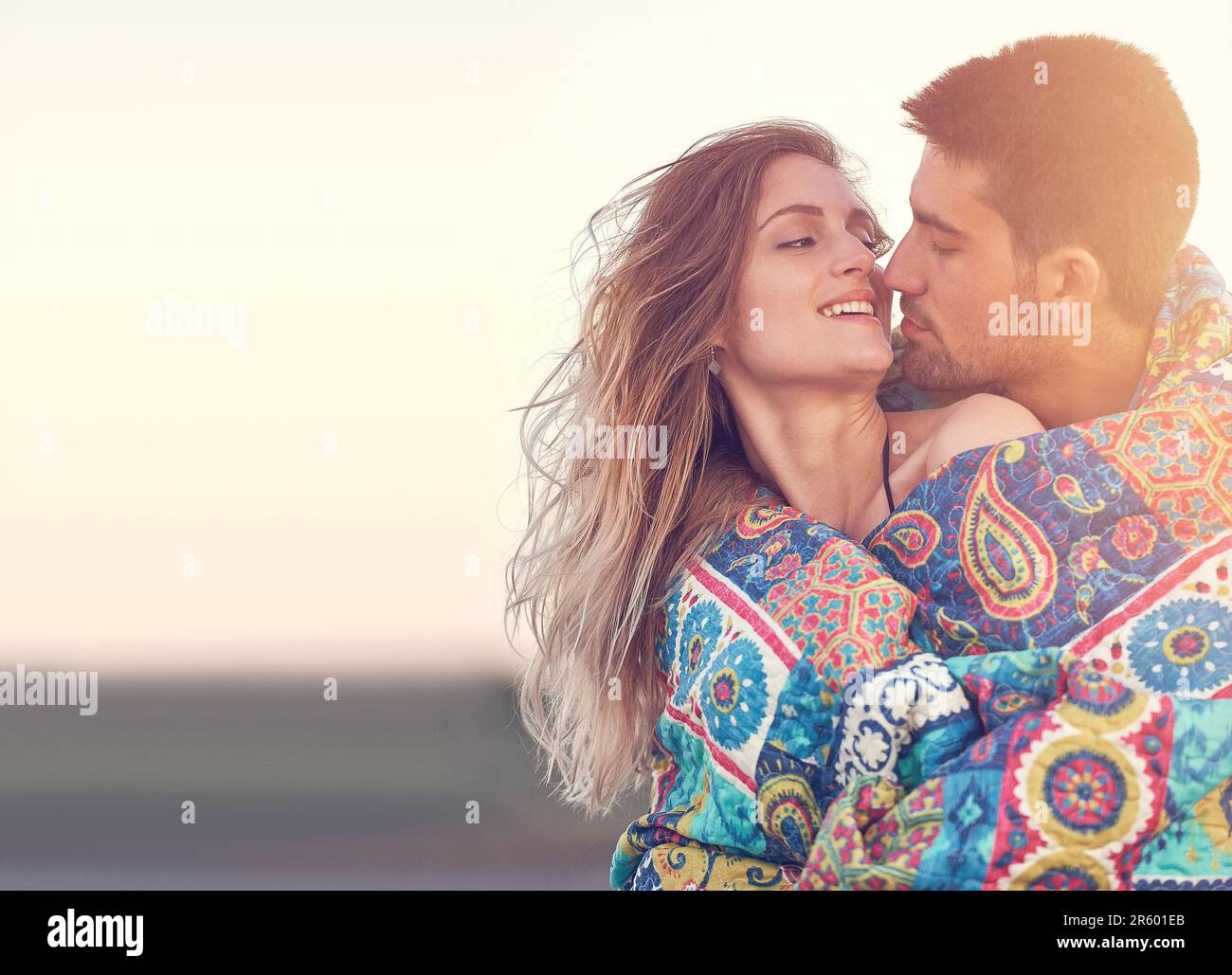 I wish we could stay like this forever. an affectionate young couple at ...