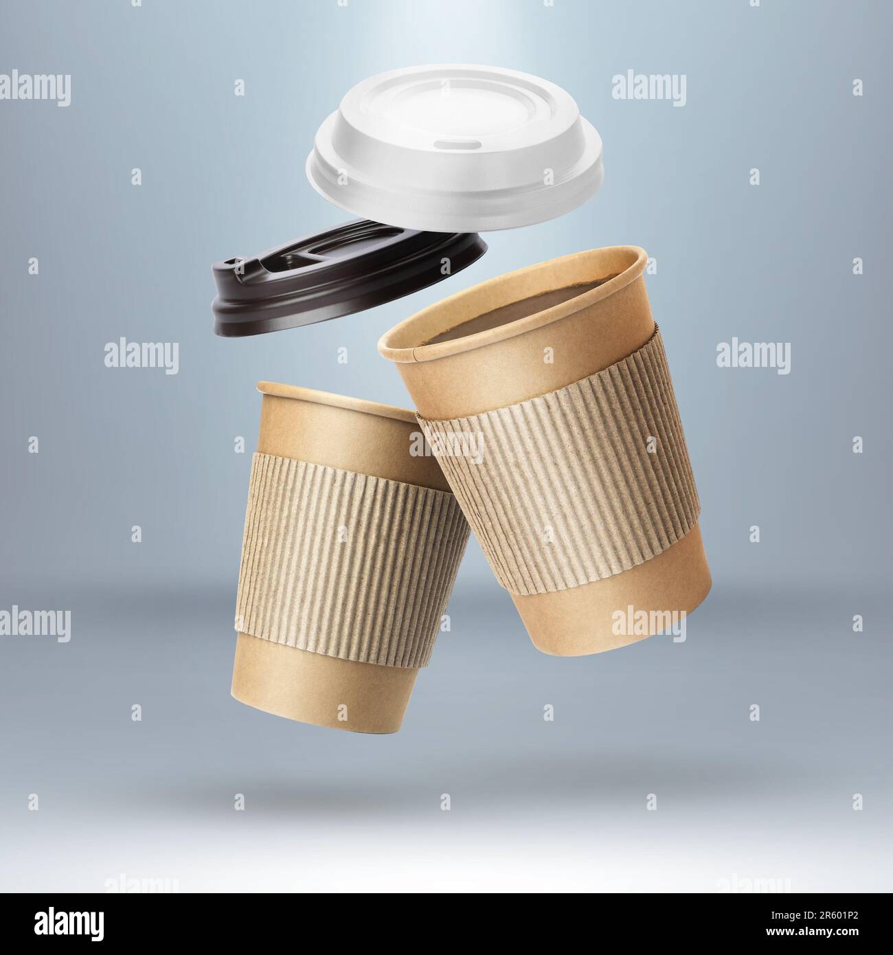 Takeaway paper cups on light grey background Stock Photo - Alamy