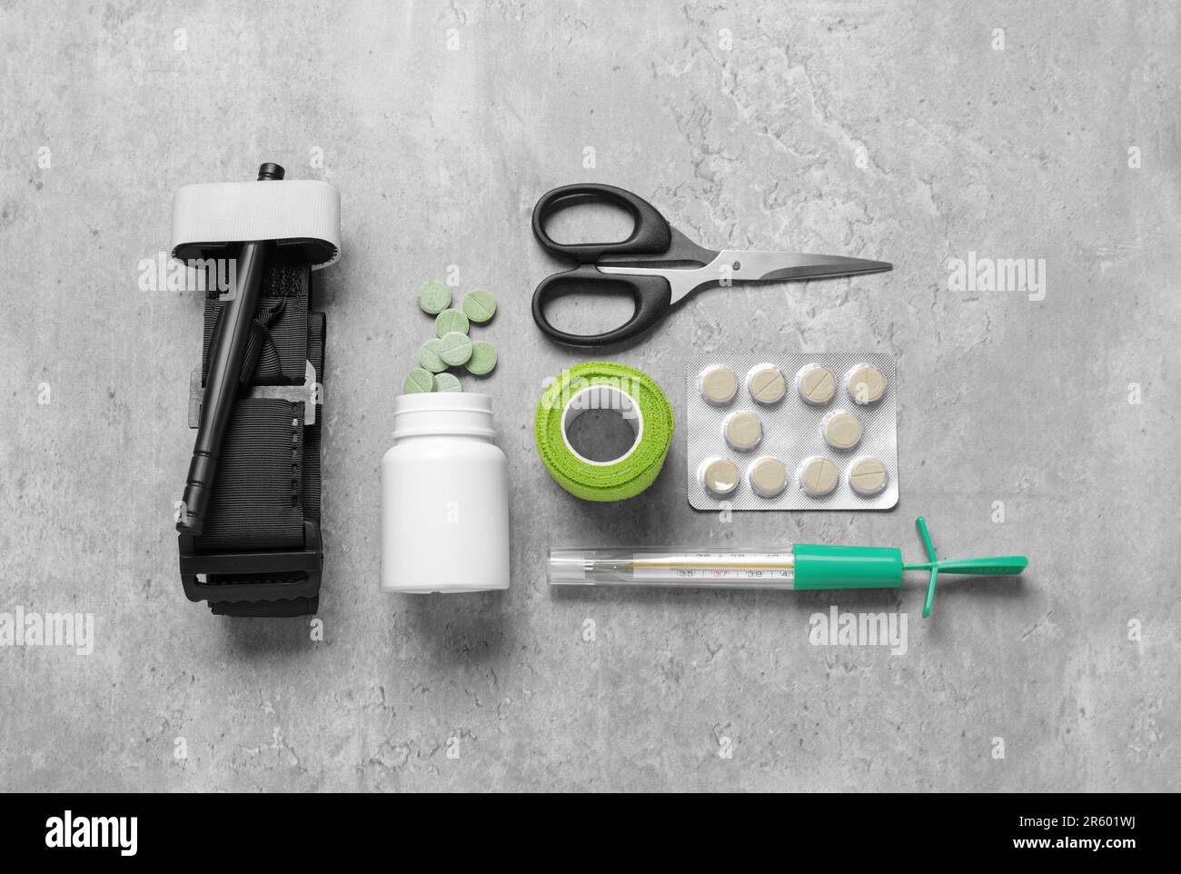 Flat lay composition with medical tourniquet on light grey table Stock ...