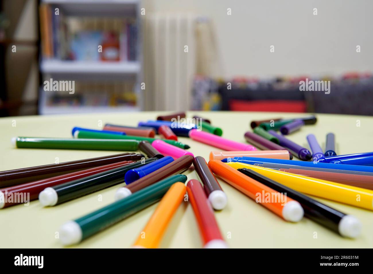 disorder and colored pens for draw in a childhood class. Markers for ...