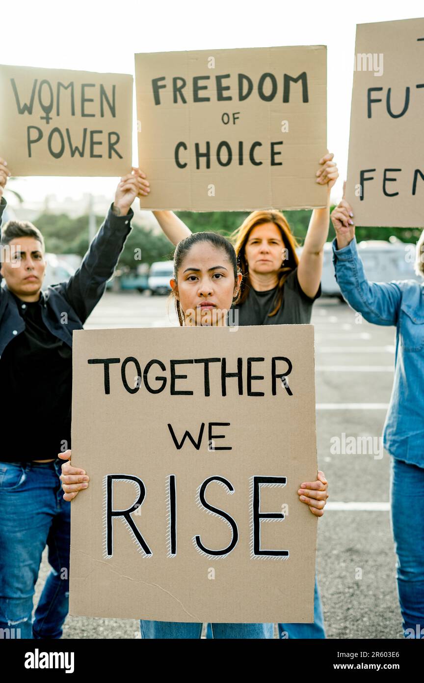 Group of female protesters with placards Stock Photo - Alamy